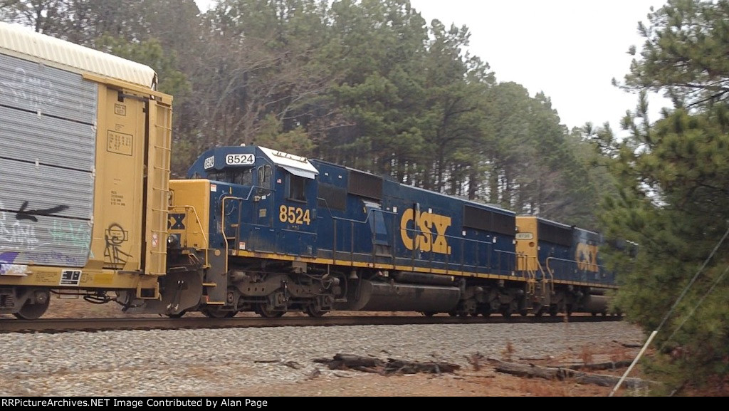 CSX SD60I 8730 and SD50-2 8524 rush empty autoracks NB
